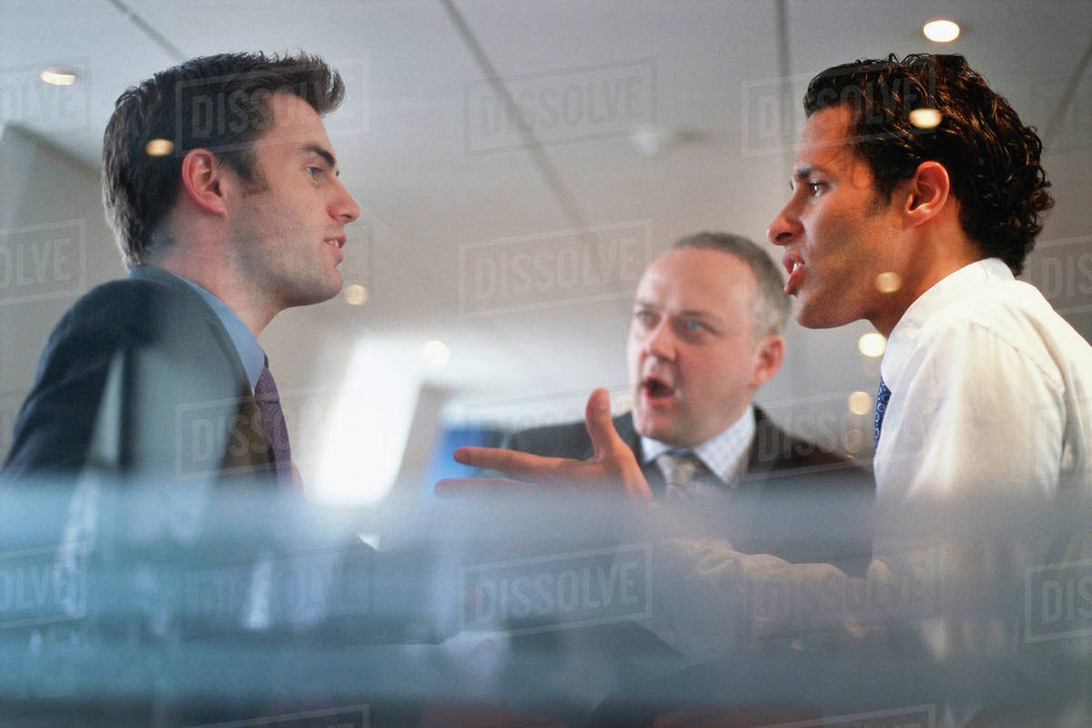 Caucasian businessmen arguing in office - Royalty-free Stock Photo ...