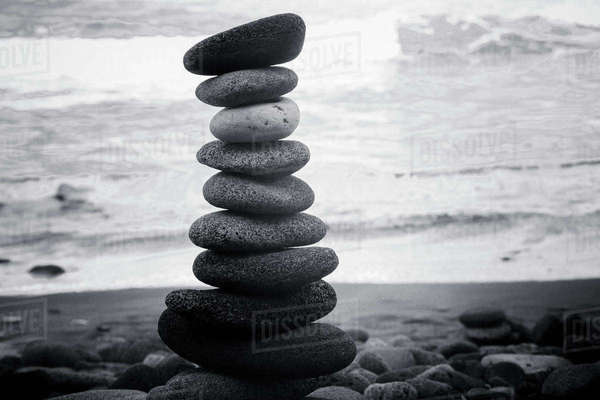 Stacked rocks on beach - Royalty-free Stock Photo | Dissolve
