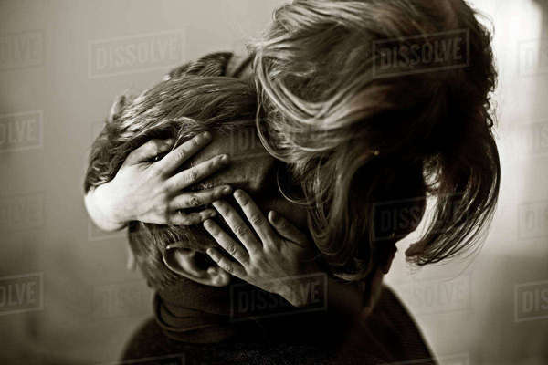 Caucasian daughter hugging head of father - Royalty-free Stock Photo ...