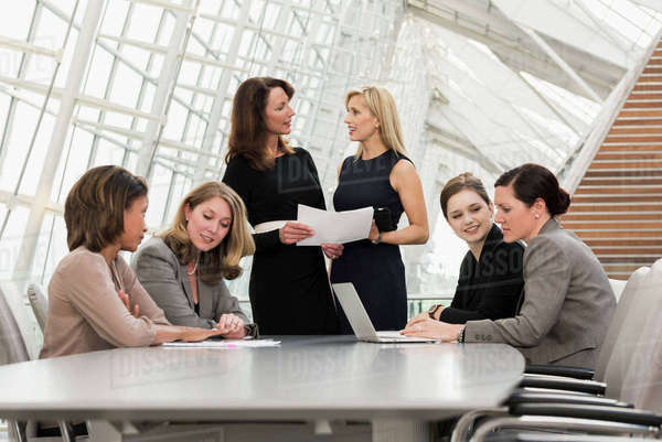 Busy businesswomen meeting in conference room - Royalty-free Stock ...