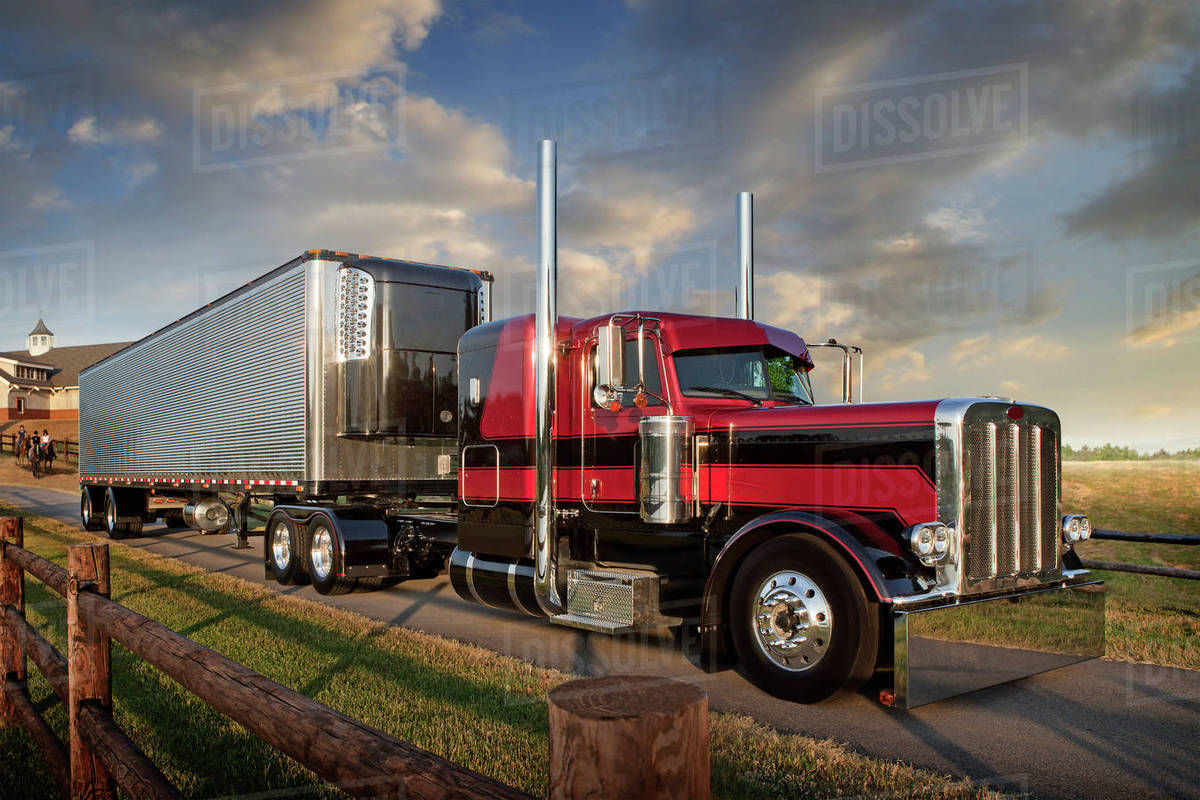 Semi-truck driving on rural road - Royalty-free Stock Photo | Dissolve
