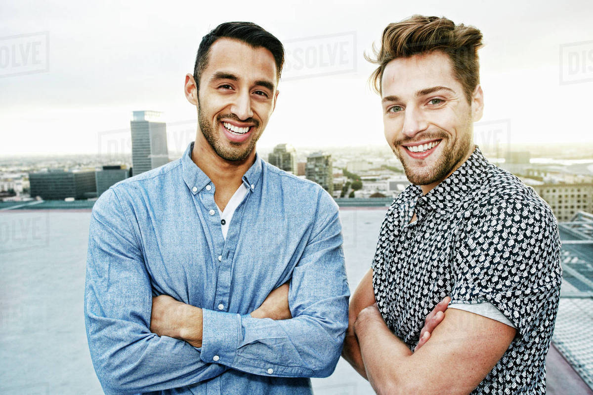 Stylish men posing on urban rooftop - Royalty-free Stock Photo | Dissolve