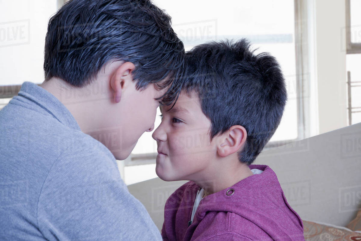 Hispanic brothers face to face with attitude - Royalty-free Stock Photo ...