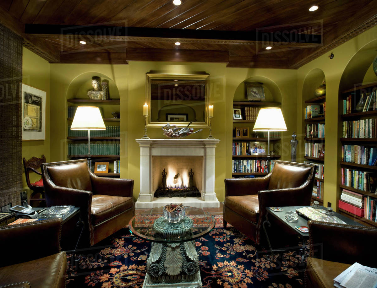 Symmetrical library in andalucian style home - Stock Photo - Dissolve