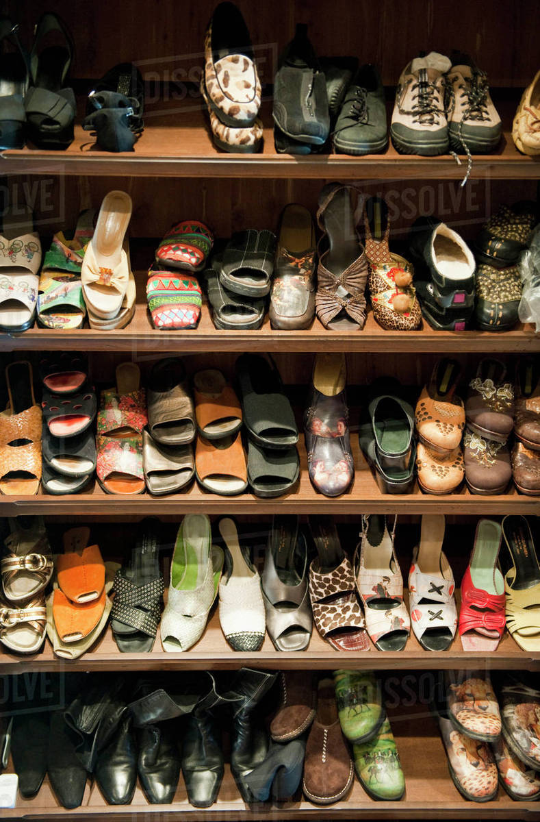 Collection of Woman's shoes on shelf - Royalty-free Stock Photo | Dissolve
