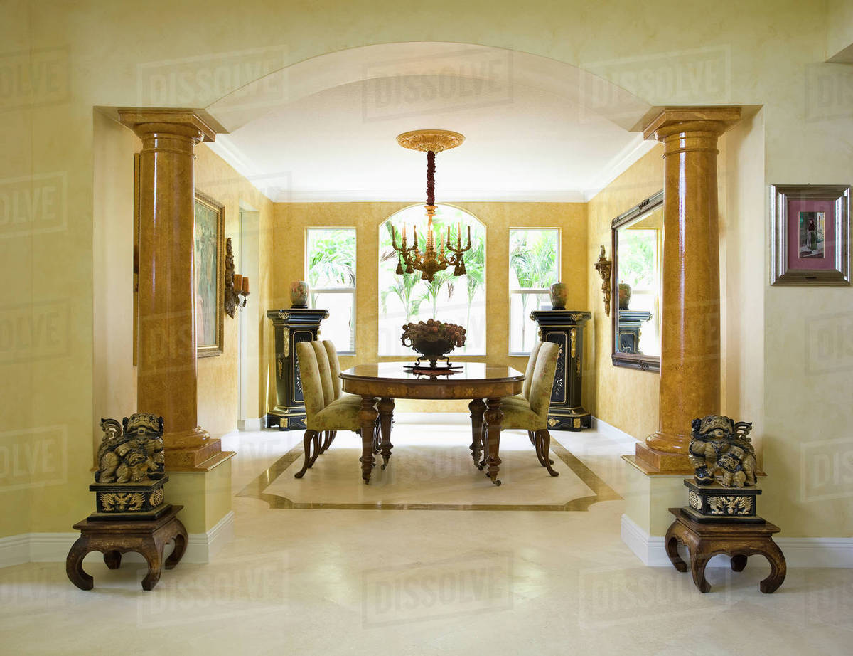 Symmetrical view of elegant dining room - Stock Photo - Dissolve
