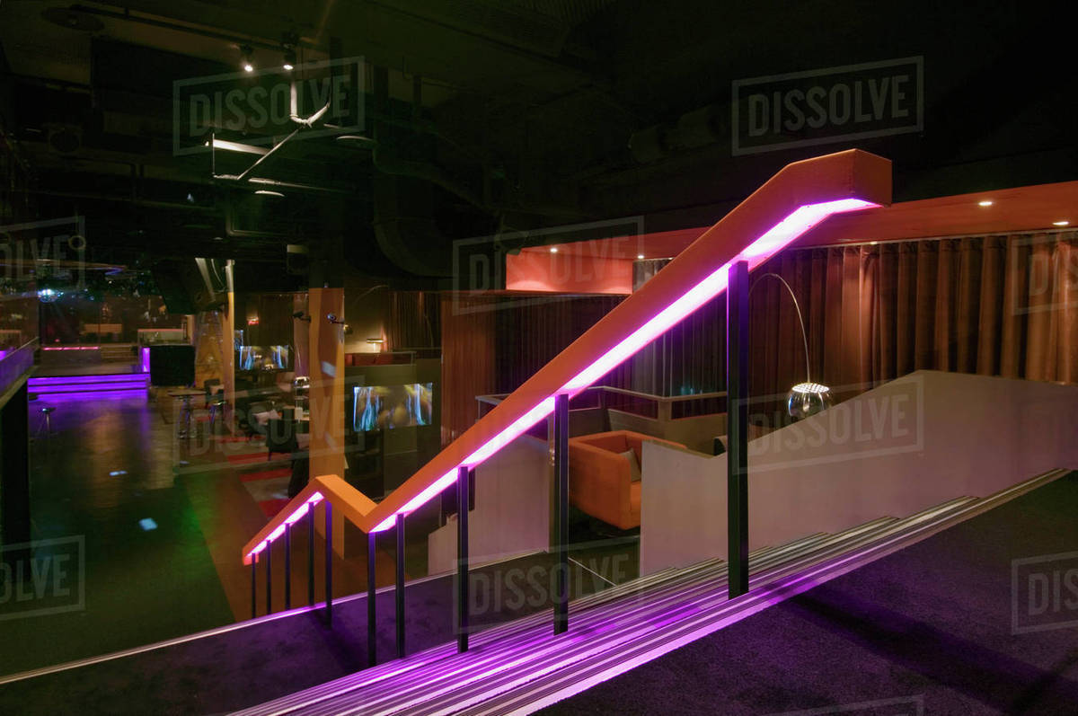 Staircase leading down to lounge area in nightclub - Royalty-free Stock ...