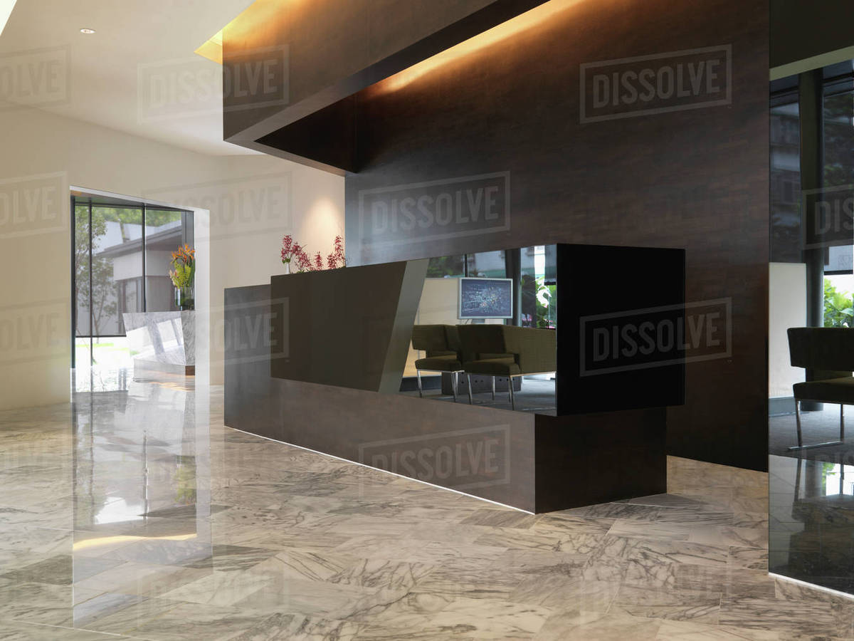 Reception desk with reflection of modern chairs - Royalty-free Stock ...