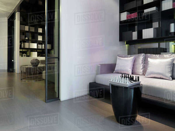 Low angle modern satin sofa and chess game - Royalty-free Stock Photo ...