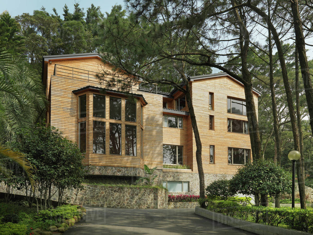 Exterior view of cabin with stone foundation - Stock Photo - Dissolve