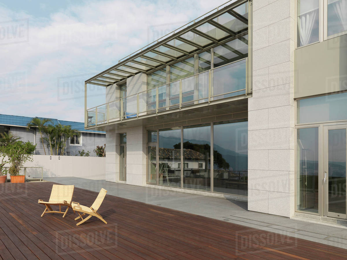 Deck out back of modern multiple story home - Royalty-free Stock Photo ...