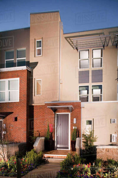 Exterior view of loft style homes - Stock Photo - Dissolve