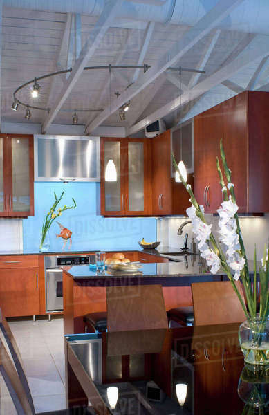 Modern kitchen with rafters - Stock Photo - Dissolve