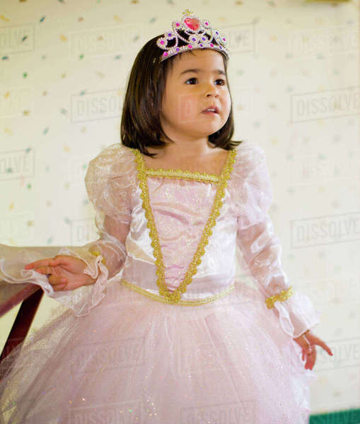 Asian girl dressing up in princess costume - Stock Photo - Dissolve