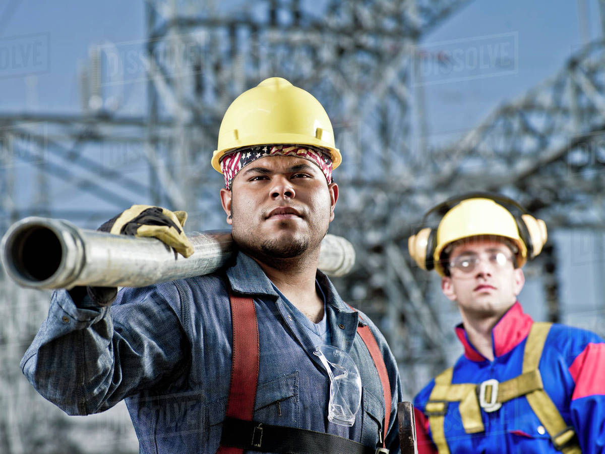 Construction workers standing together - Royalty-free Stock Photo ...