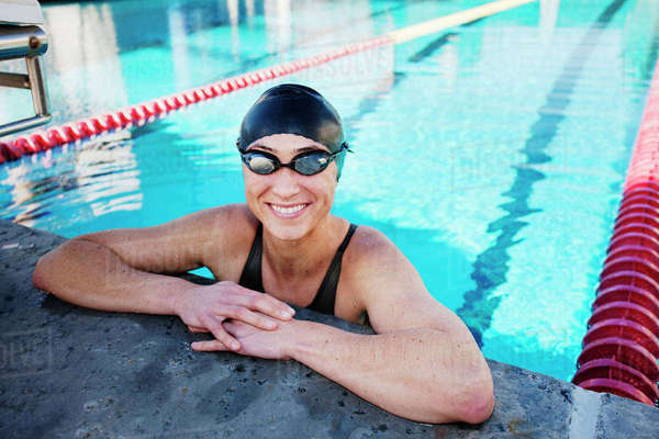 Competitive swimmer in swimming pool - Royalty-free Stock Photo | Dissolve