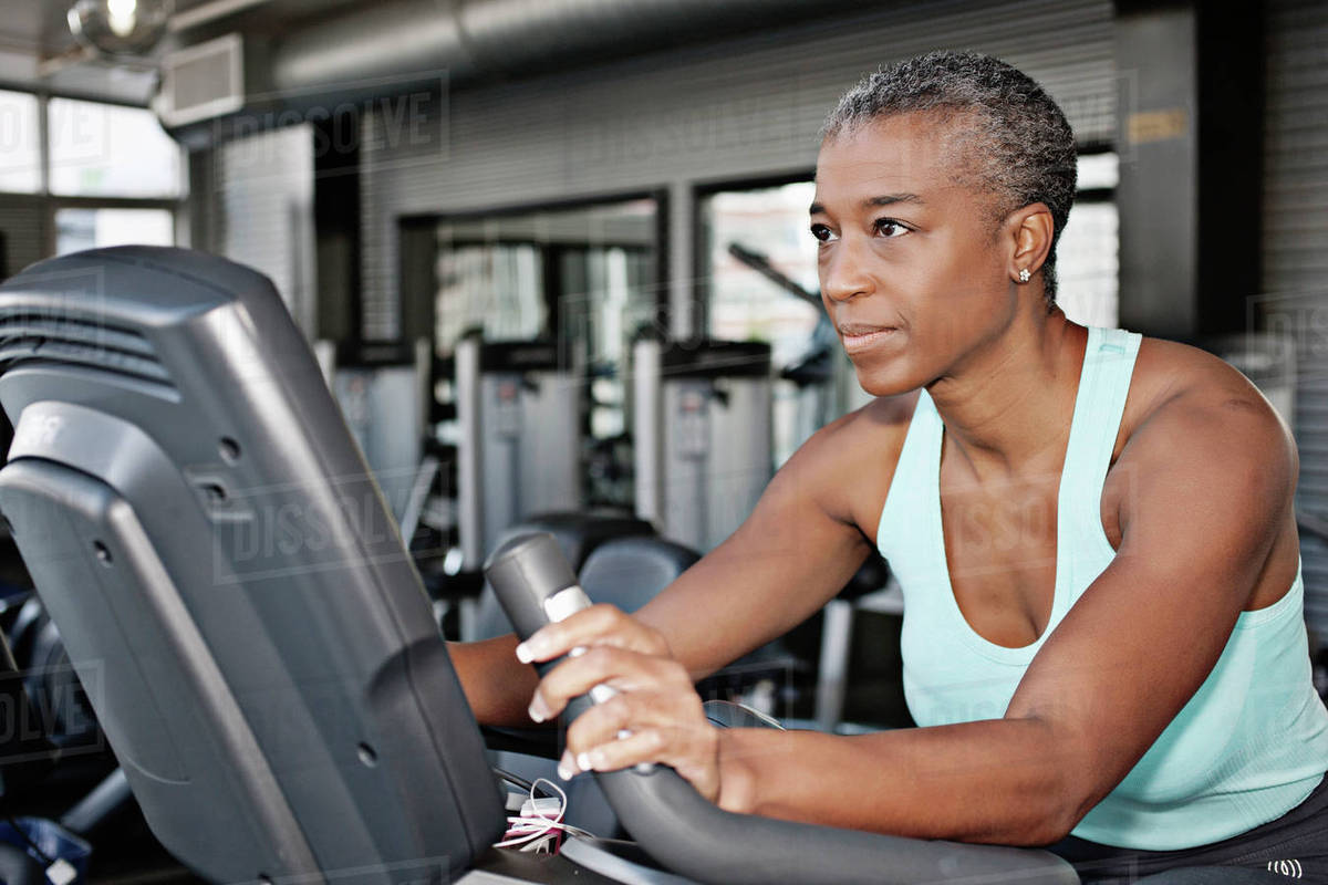 African American woman exercising in health club - Royalty-free Stock ...