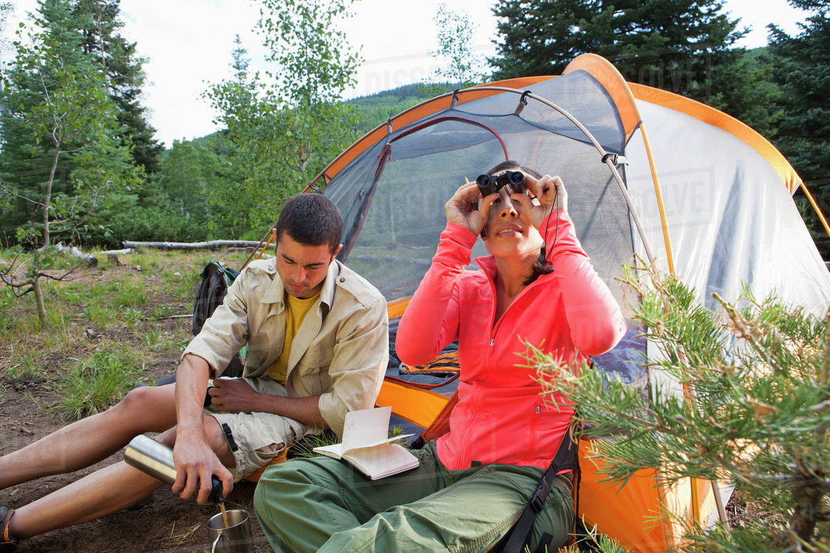 Couple camping together - Stock Photo - Dissolve