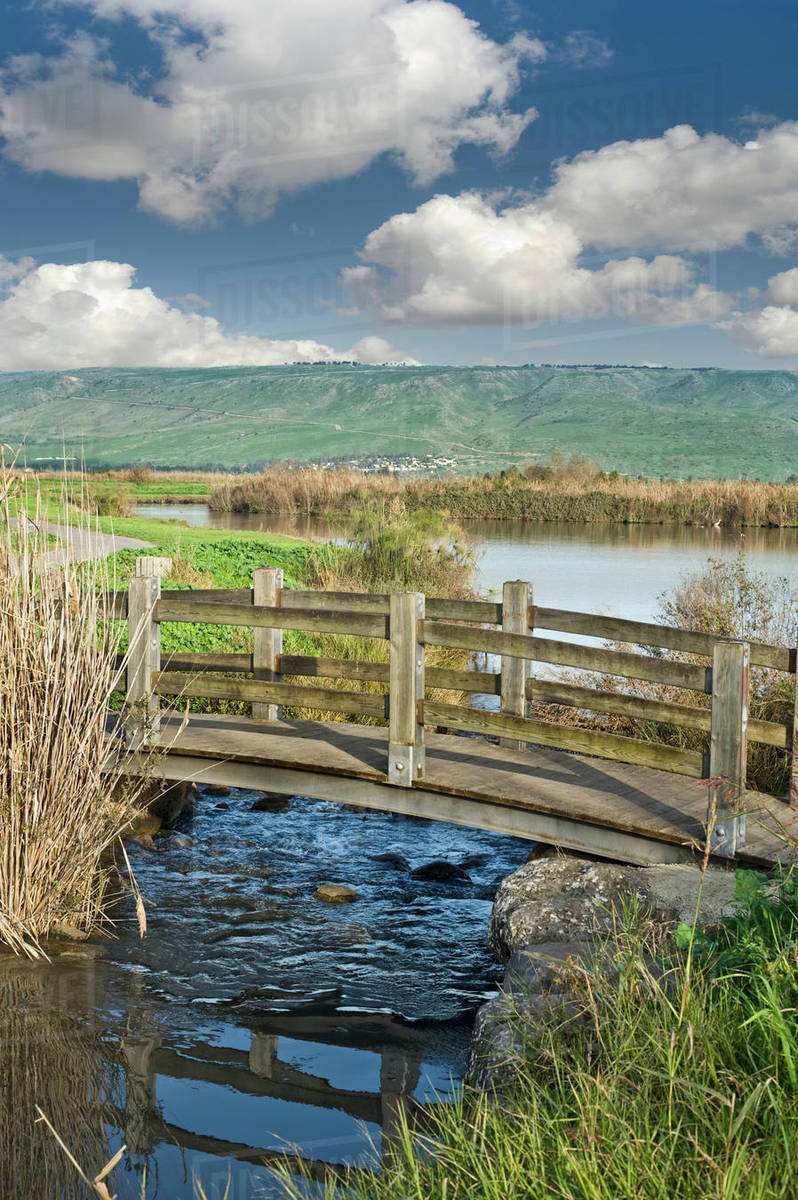 Wooden Bridge Over A Stream - Royalty-free Stock Photo | Dissolve