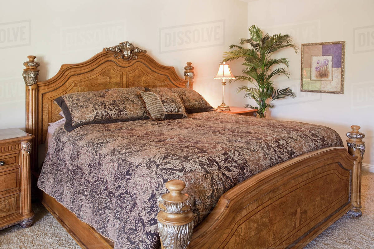 Bed in bedroom - Royalty-free Stock Photo | Dissolve