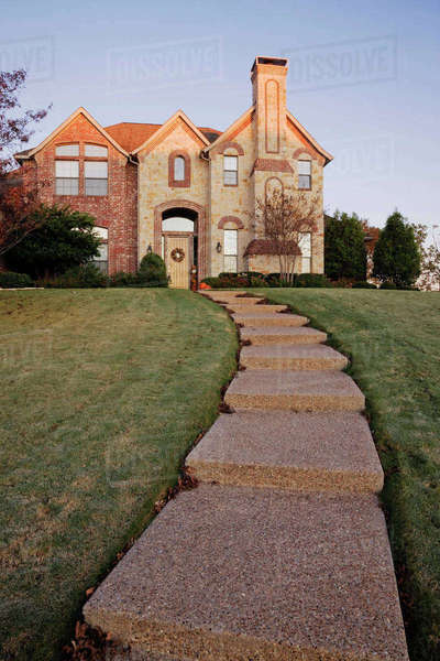 Pathway to Large Home on Hillside - Royalty-free Stock Photo | Dissolve