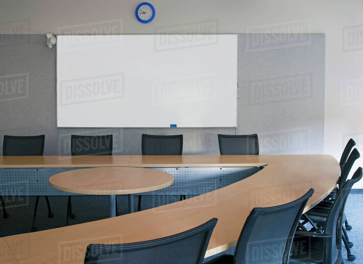 Projection screen, table and chairs in conference room - Royalty-free ...