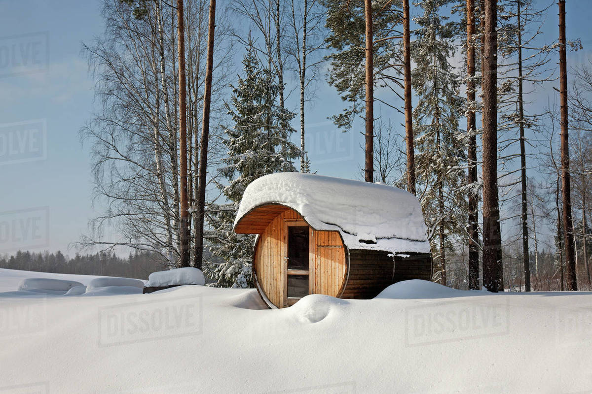 Round Barrel Sauna in the Snow - Royalty-free Stock Photo | Dissolve