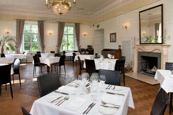 Place settings on tables in luxury restaurant - Royalty-free Stock ...