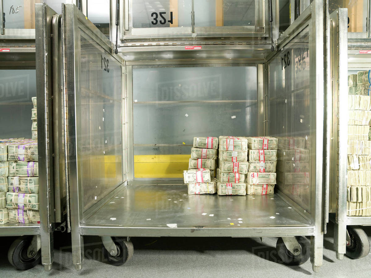 US Dollar Bills in a Bank Cart - Stock Photo - Dissolve