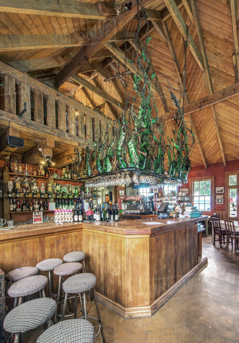 Empty bar and stools in restaurant - Royalty-free Stock Photo | Dissolve