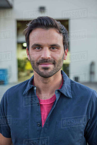 Man smiling outdoors - Royalty-free Stock Photo | Dissolve