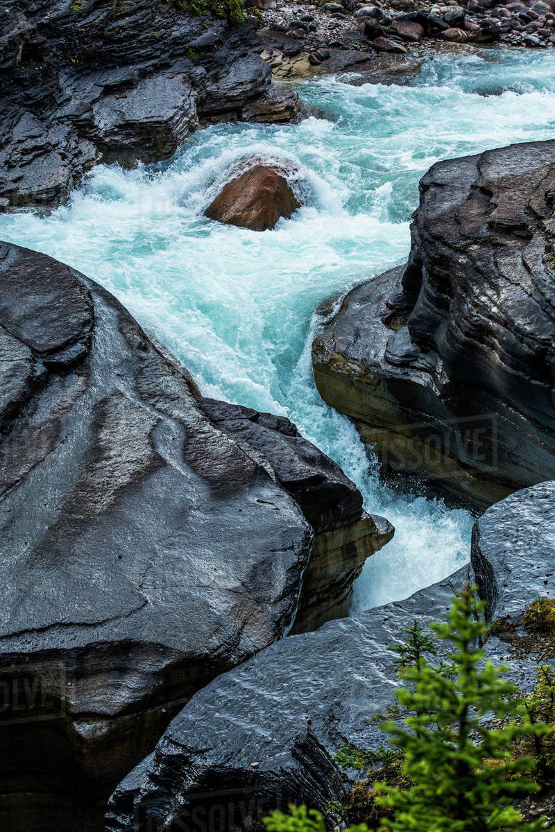 Rapids winding through rocks - Royalty-free Stock Photo | Dissolve