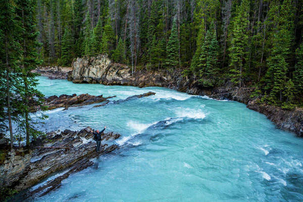 Rapids in bending river - Stock Photo - Dissolve