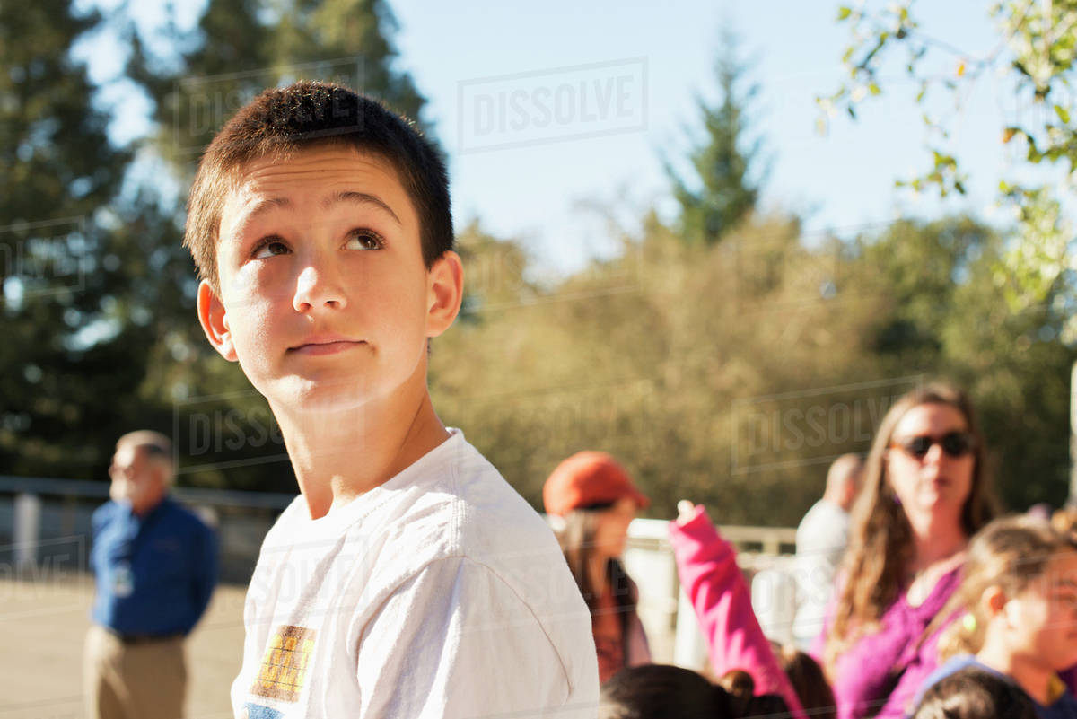 Caucasian student looking up on field trip - Royalty-free Stock Photo ...