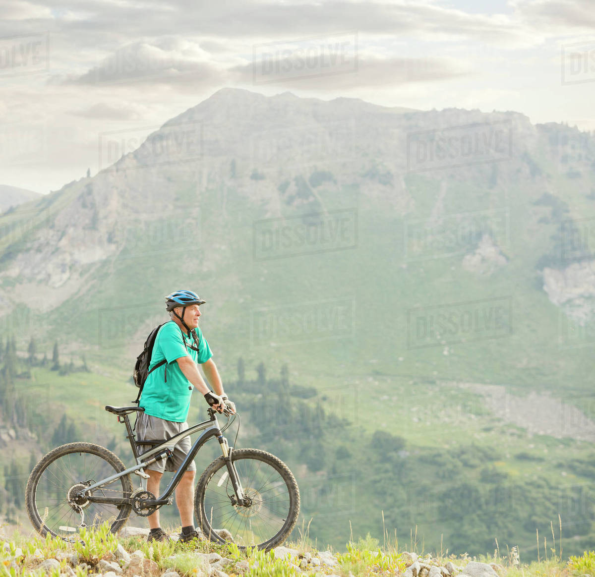 Caucasian man standing with mountain bike - Royalty-free Stock Photo ...