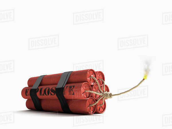 Lit bundle of dynamite - Royalty-free Stock Photo | Dissolve