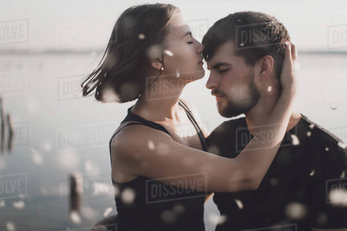 Water splashing on couple hugging at lake - Royalty-free Stock Photo ...