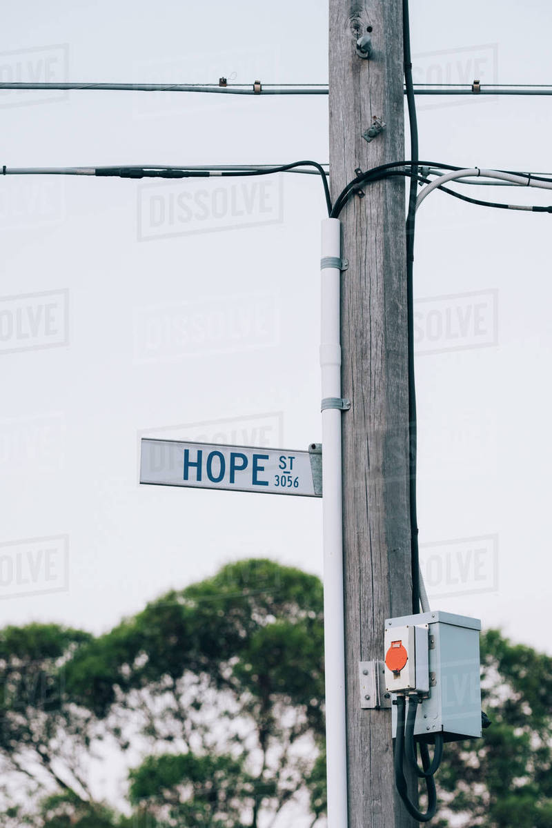 Hope street sign on utility pole - Royalty-free Stock Photo | Dissolve
