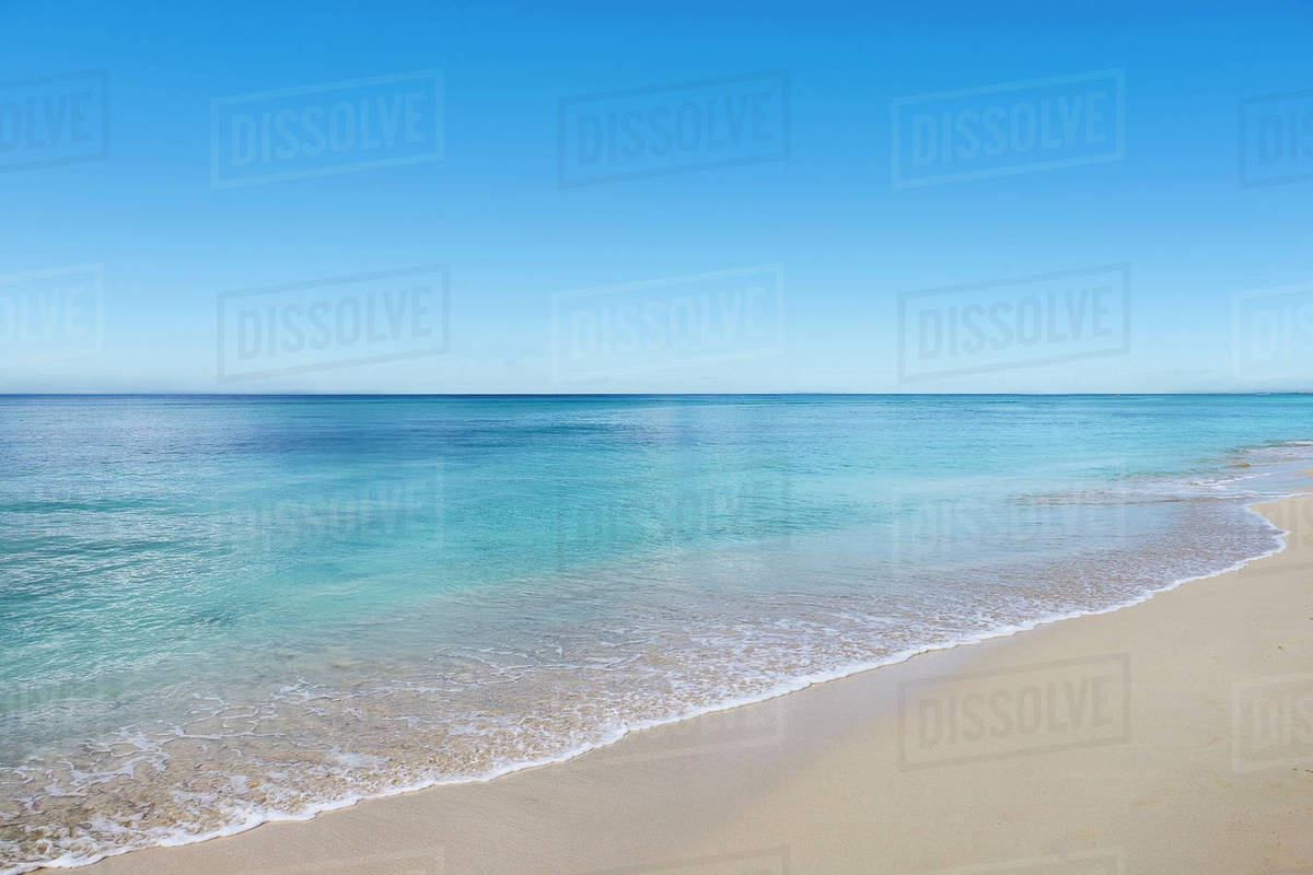 Sunny ocean beach - Royalty-free Stock Photo | Dissolve