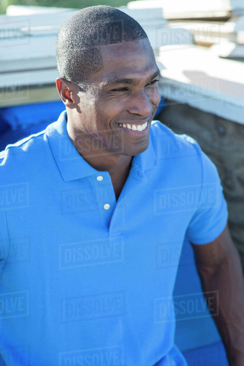 Portrait of smiling Black man - Royalty-free Stock Photo | Dissolve