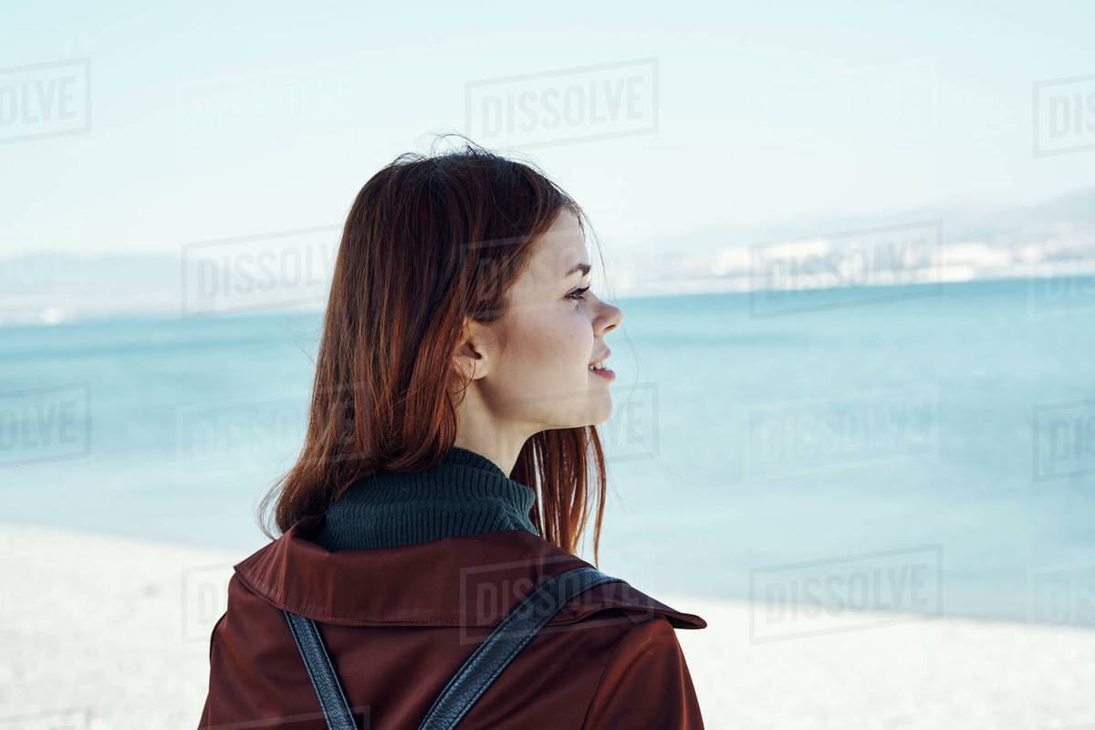 Caucasian woman at beach - Royalty-free Stock Photo | Dissolve