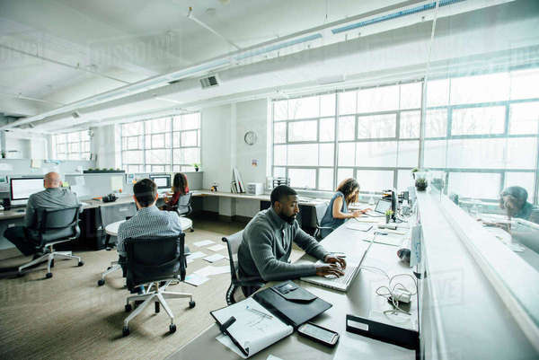 Business people working in busy office - Royalty-free Stock Photo ...