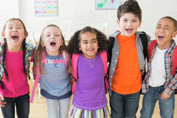 Students standing in line in classroom - Royalty-free Stock Photo ...