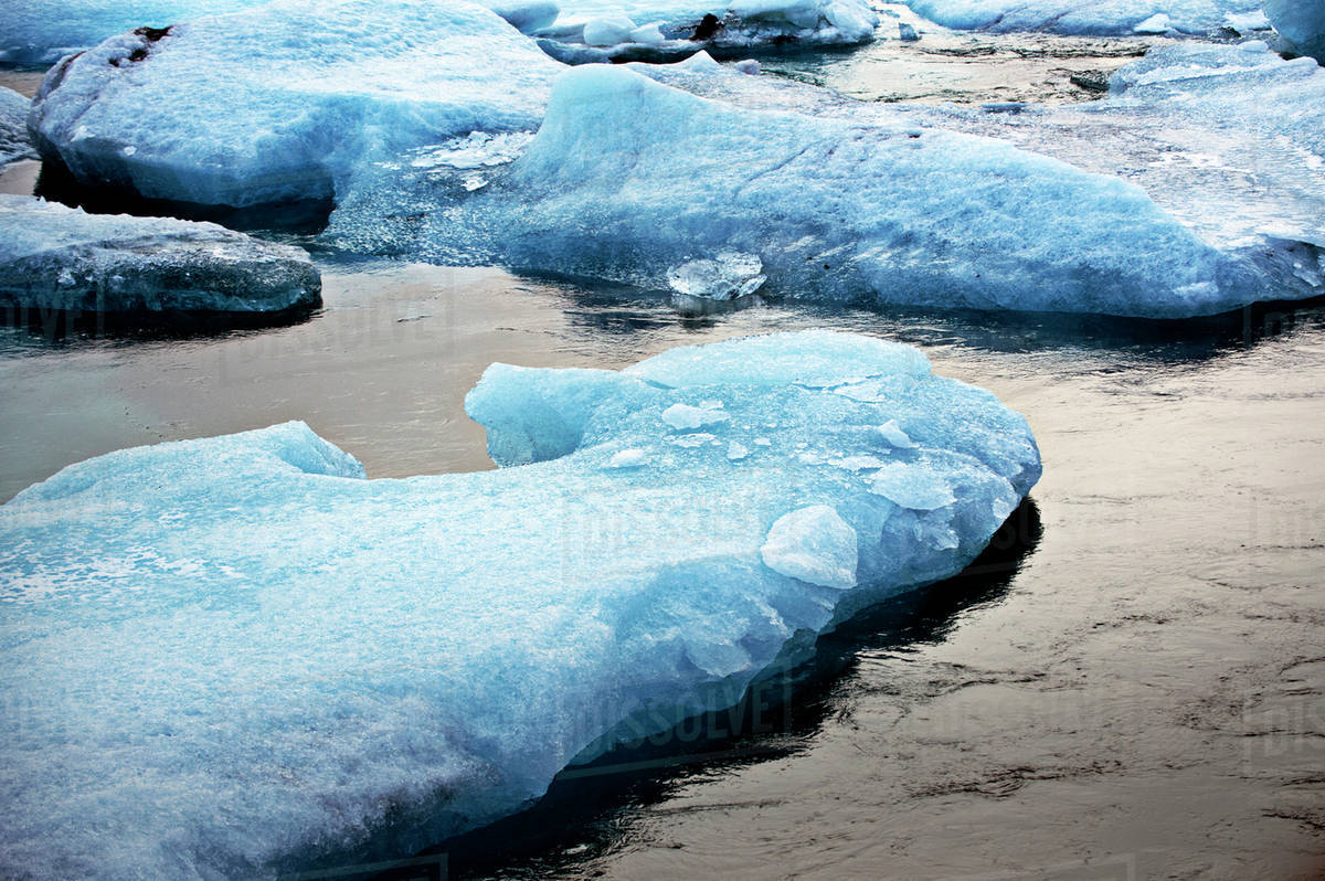 Glaciers floating in arctic water - Royalty-free Stock Photo | Dissolve