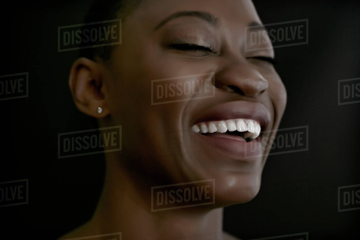 Black woman smiling - Royalty-free Stock Photo | Dissolve