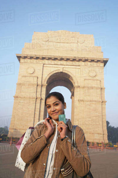 Indian woman smiling by India Gate, Delhi, India - Royalty-free Stock ...