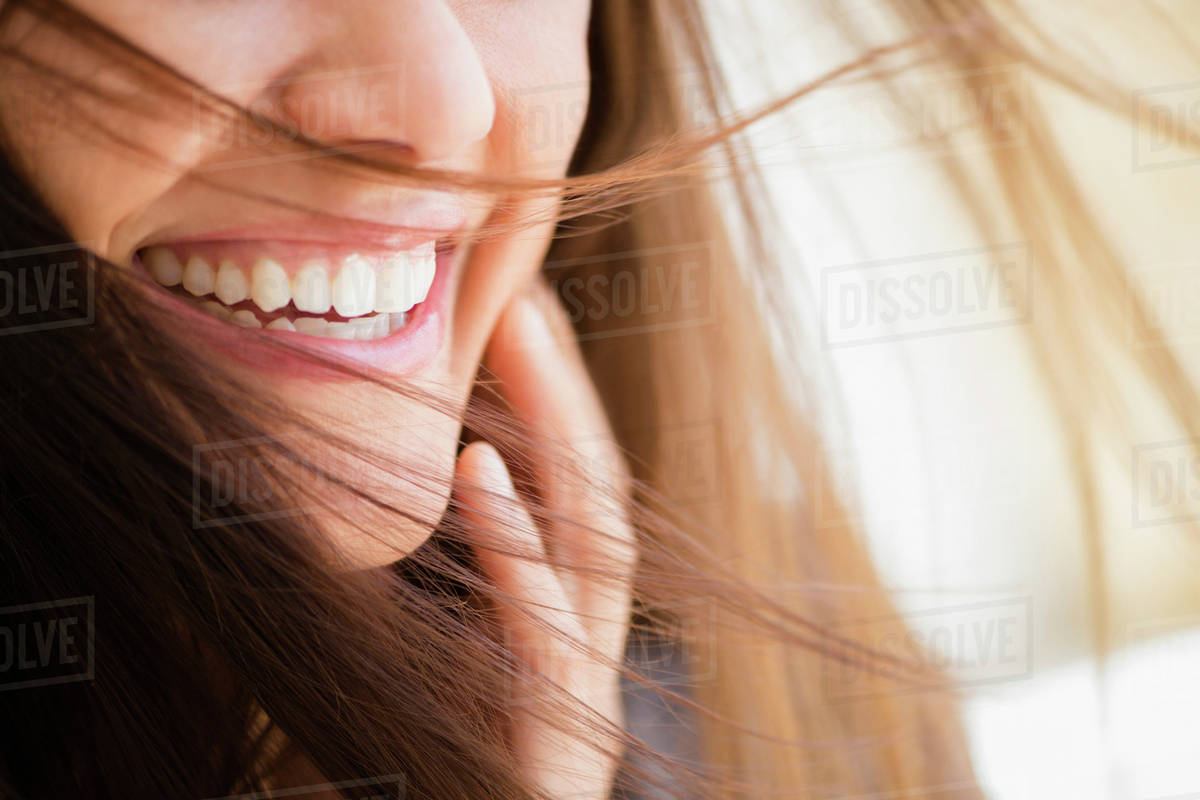 Close up of woman smiling - Royalty-free Stock Photo | Dissolve