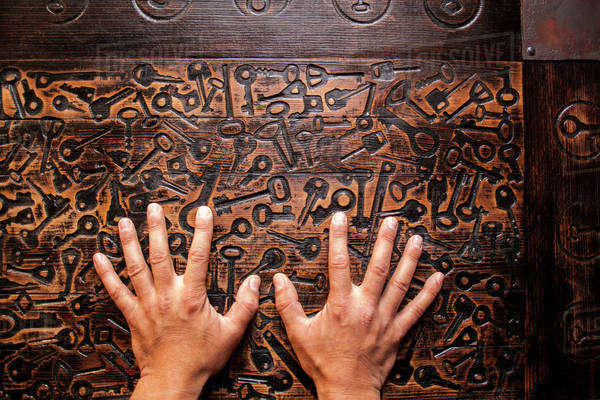 Close up of hands of Mari man hands on wooden surface - Royalty-free ...