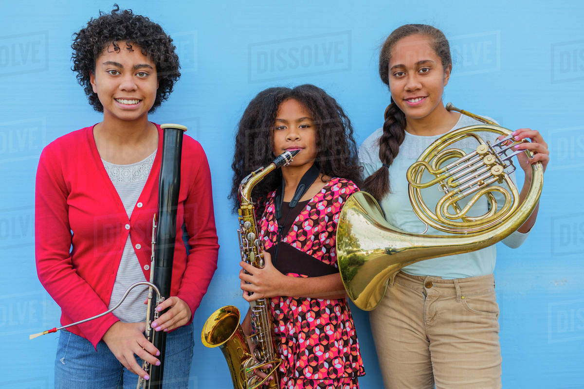 Pacific Islander girls holding musical instruments - Royalty-free Stock ...