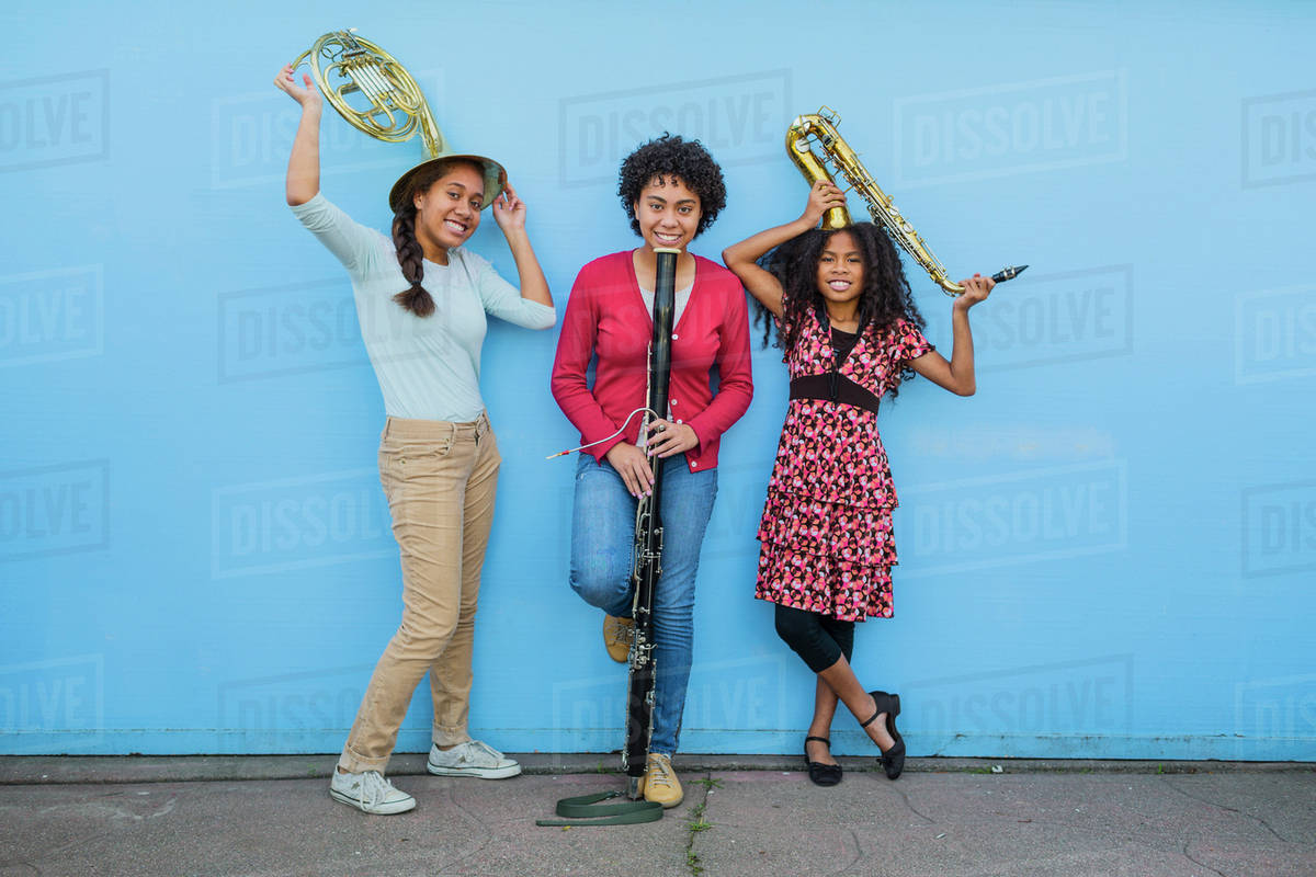 Pacific Islander girls holding musical instruments - Royalty-free Stock ...